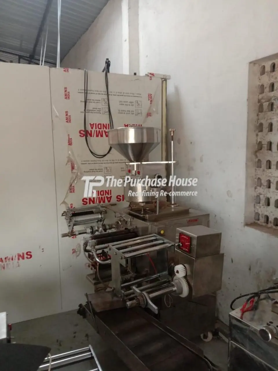 STRIP PACKAGING MACHINE
